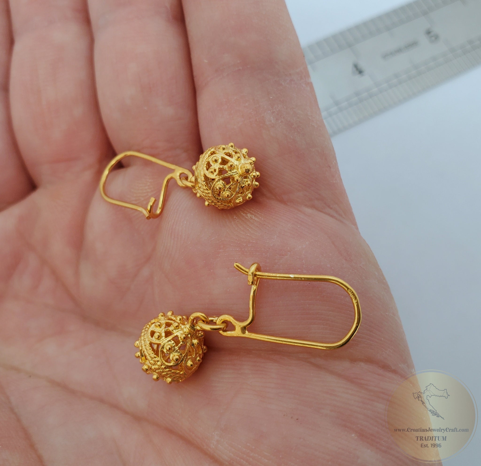 Simple gold hanging earrings store